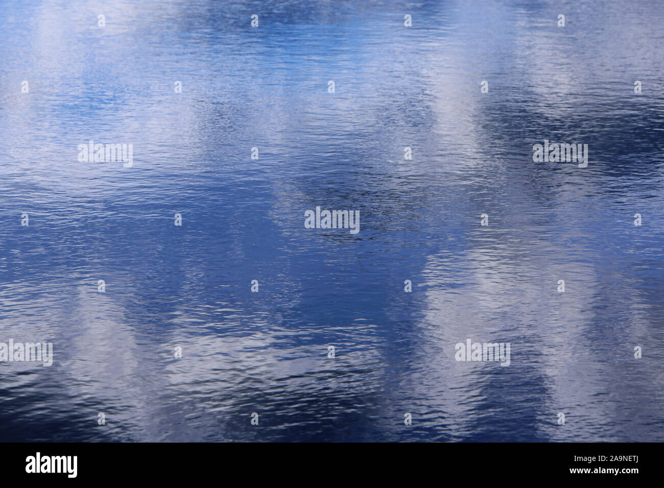 Blue water Lake, soft ripples surface reflection background Stock Photo ...