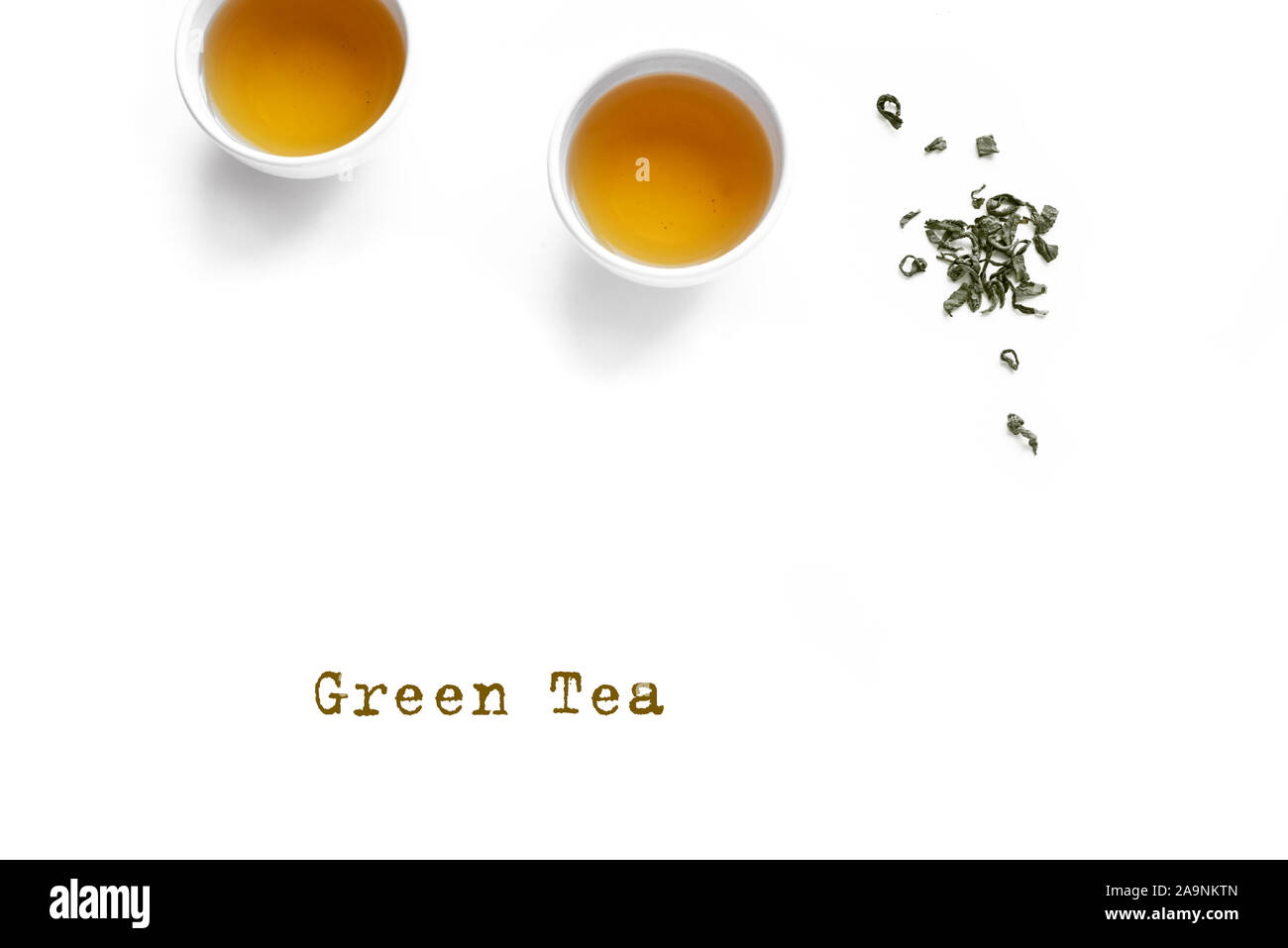Green Tea in cups and dry tea leaves isolated on white background Stock ...