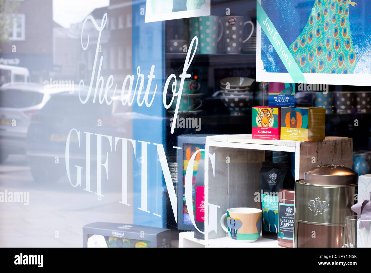 the art of gifting sign in retail shop window Stock Photo - Alamy