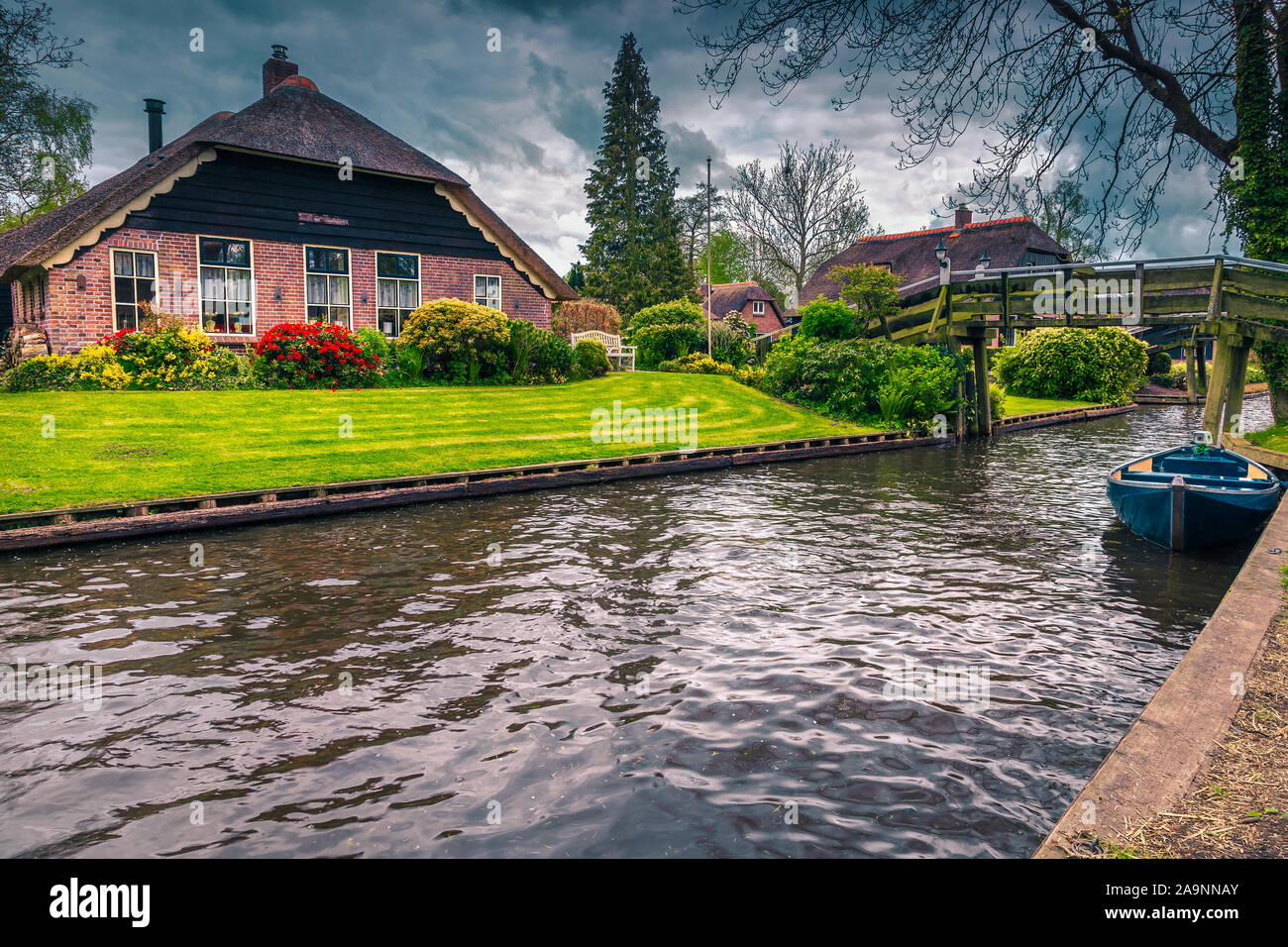 Well known touristic village with narrow water canals. Orderly houses ...