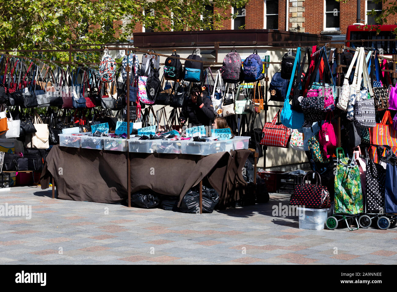 Leather ladies handbags and purses for sell on market stall Stock Photo ...