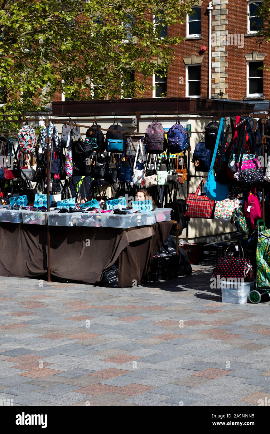 Leather ladies handbags and purses for sell on market stall Stock Photo ...
