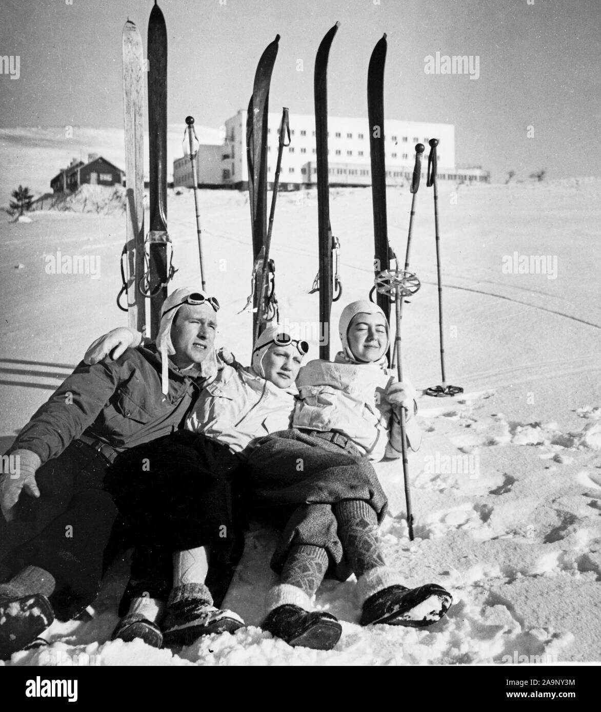 Finland History - Three skiers chilling on snow, enjoying the sun in ...