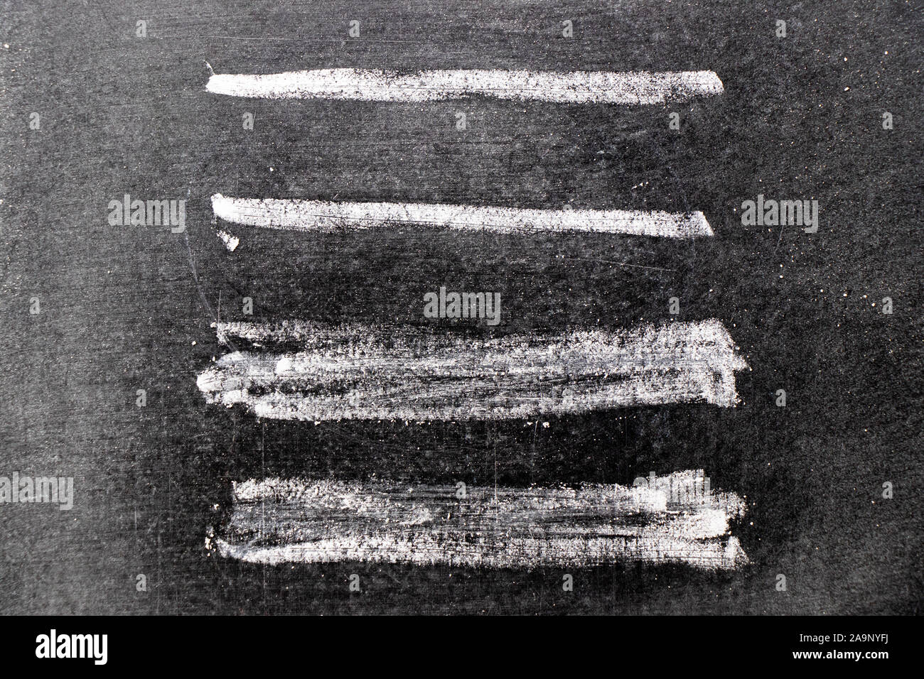 White chalk hand drawing in line shape on black board background Stock ...