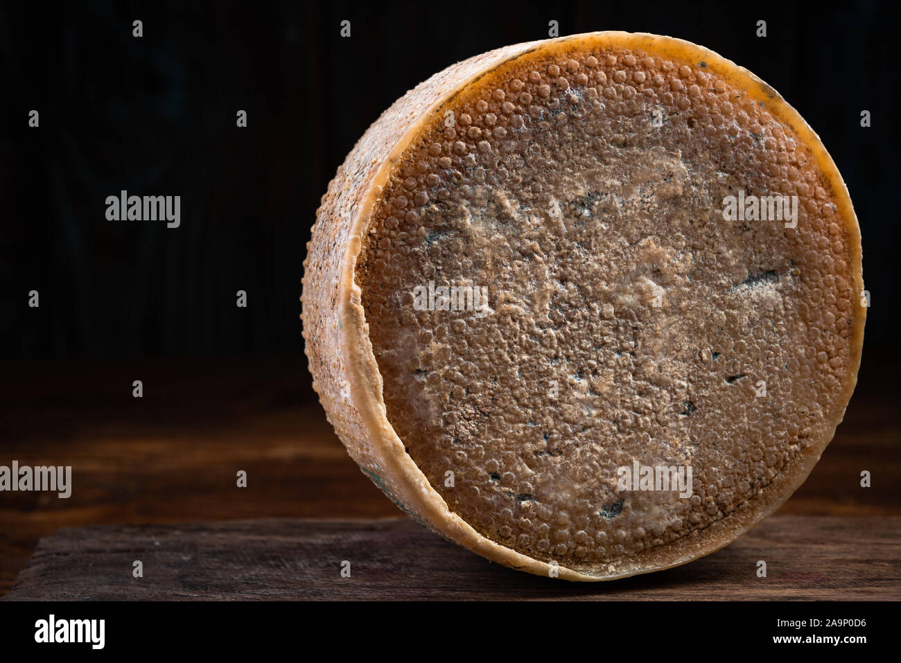 Whole Cheese Wheel on Wooden Board. Local Food Produce Stock Photo - Alamy