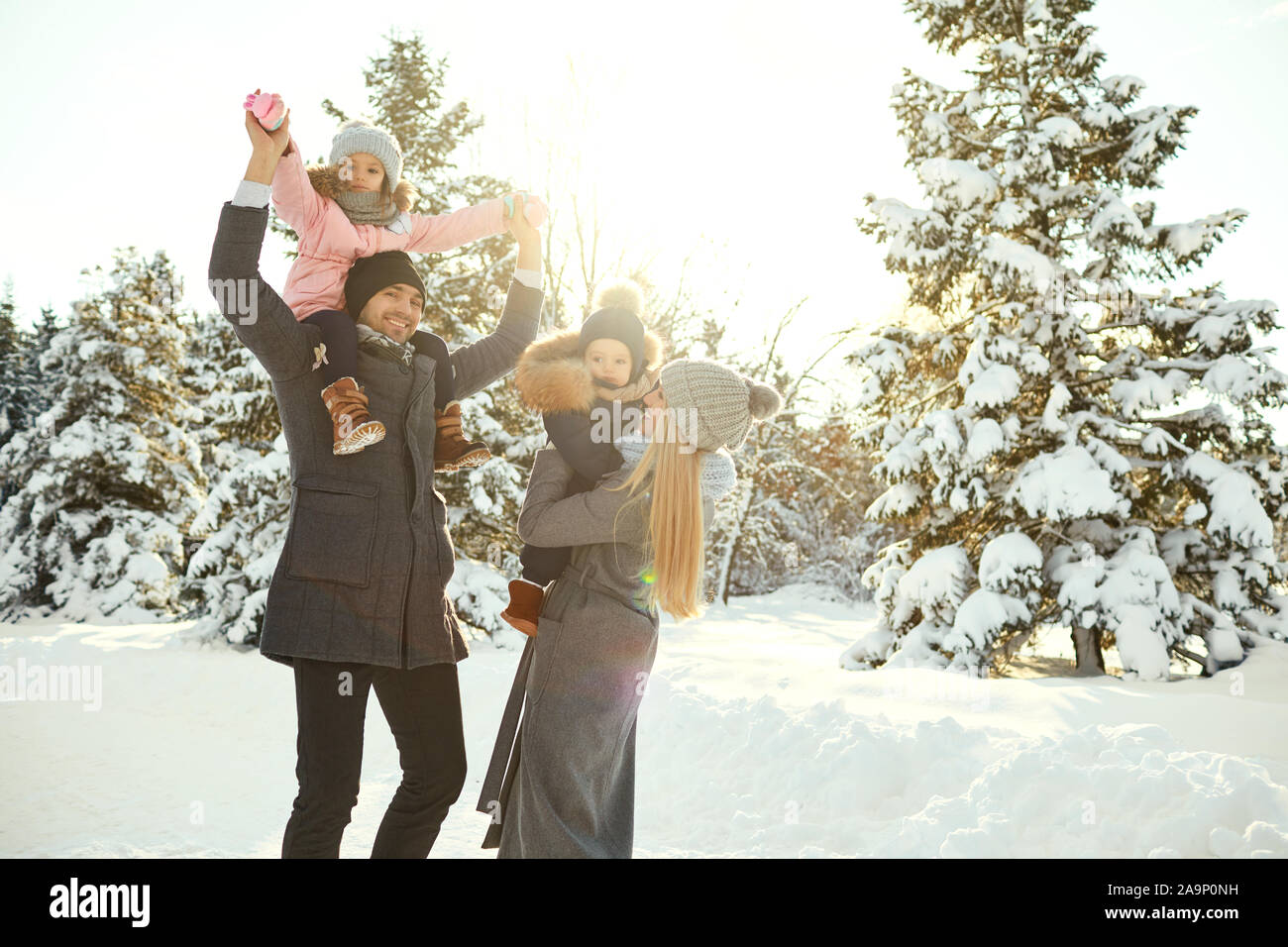 Family winter fun in park hi-res stock photography and images - Alamy