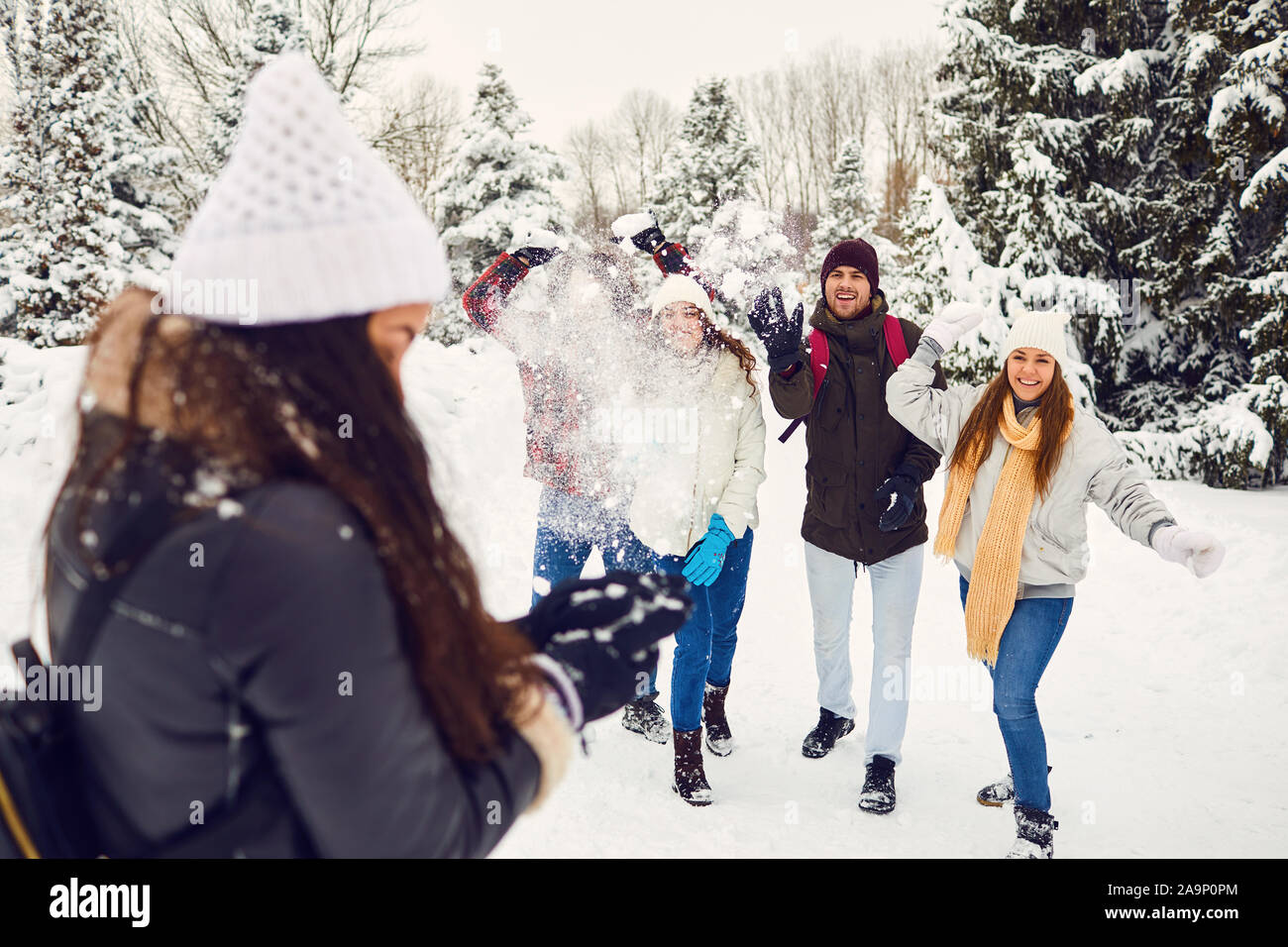 Funny snowball fight hi-res stock photography and images - Alamy