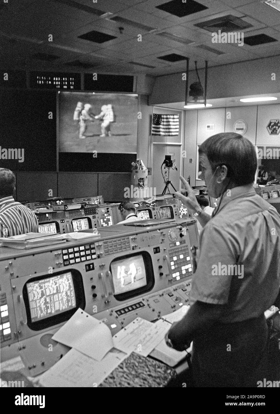 (2 Aug. 1971) --- Gerald D. Griffin, foreground, stands near his ...