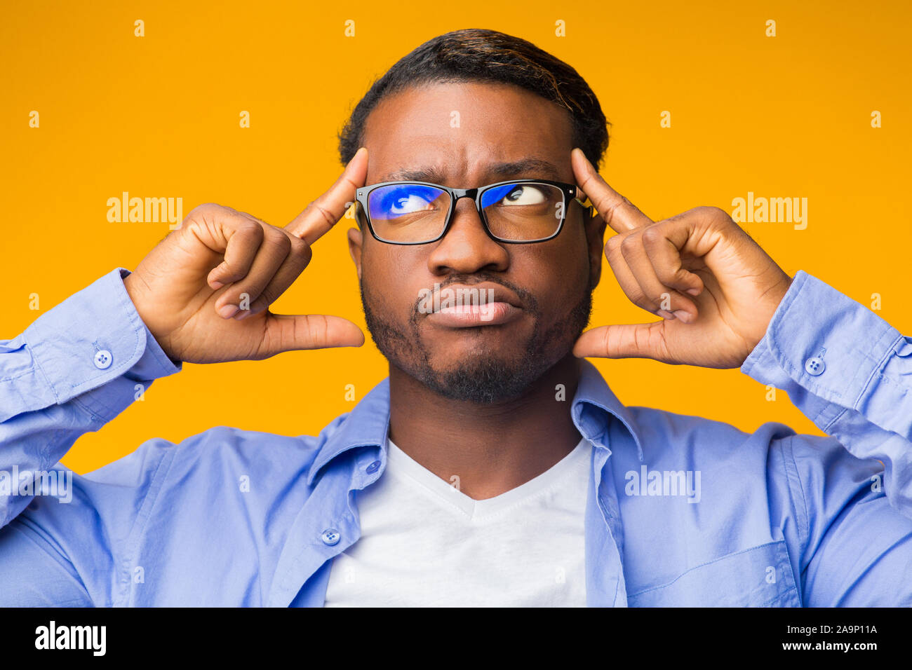 Black man thinking hard hi-res stock photography and images - Alamy