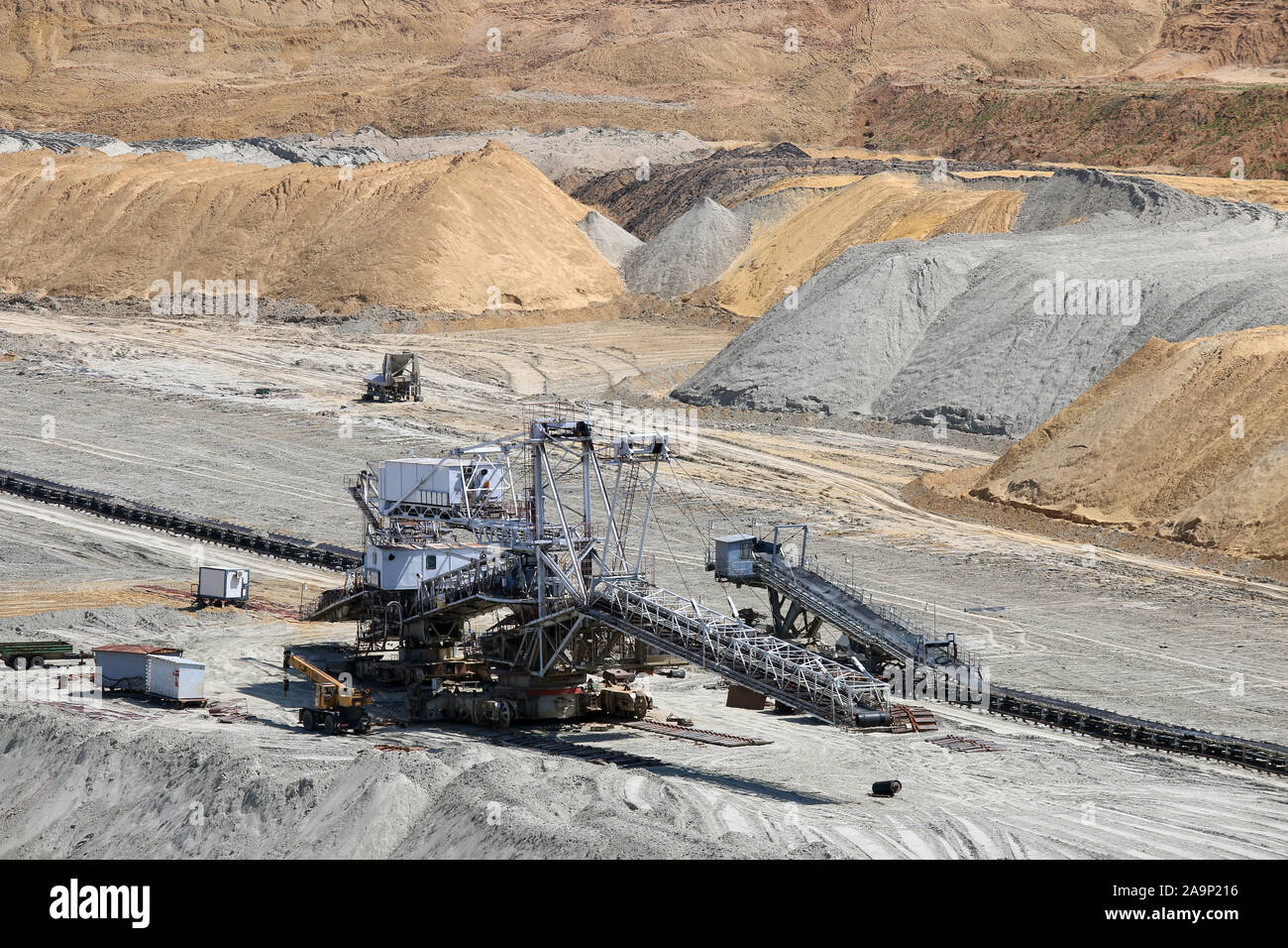 Giant excavator overhaul open pit coal mine Stock Photo - Alamy
