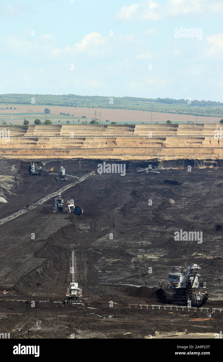 Open pit coal mine with excavators and machinery in Kostolac Stock ...
