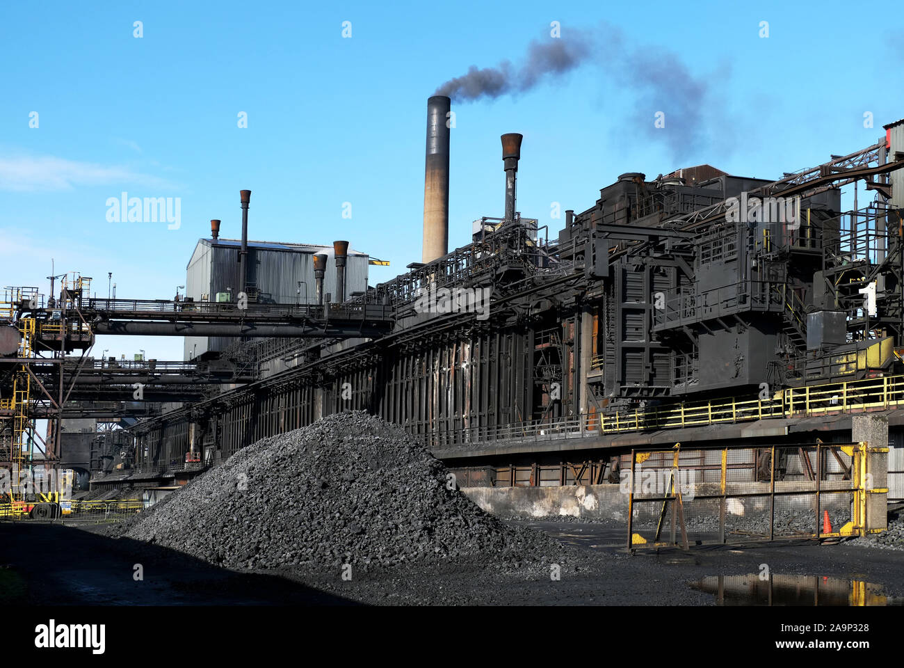 Pushing coke on coke oven plant on integrated steelworks Stock Photo ...