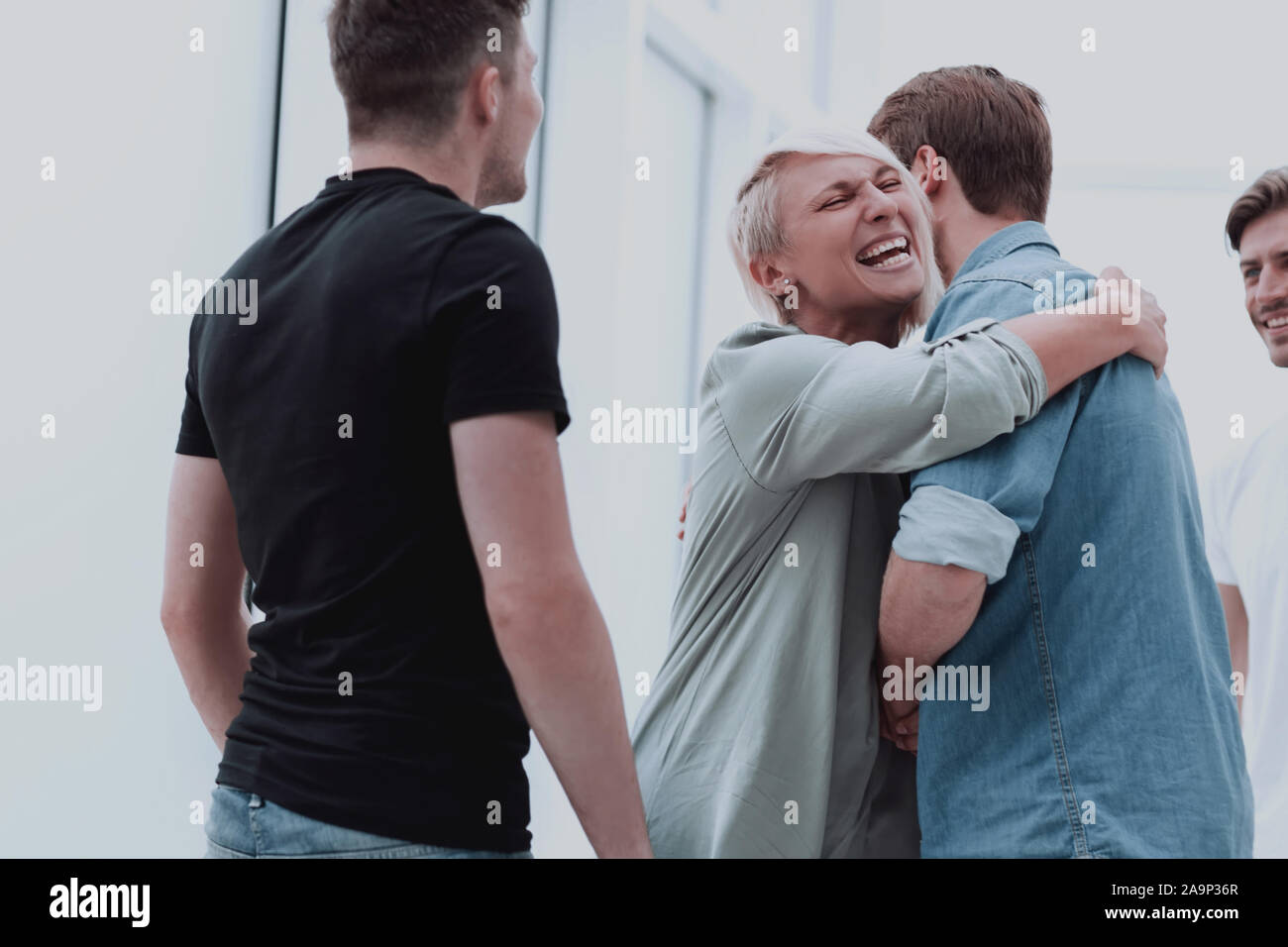 Hugging employee hi-res stock photography and images - Alamy