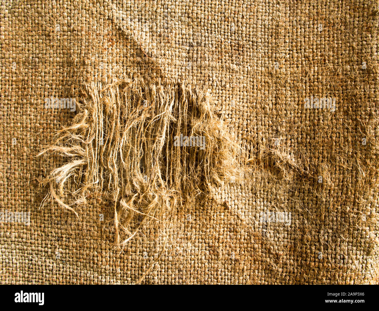 Hemp sack tattered Stock Photo - Alamy
