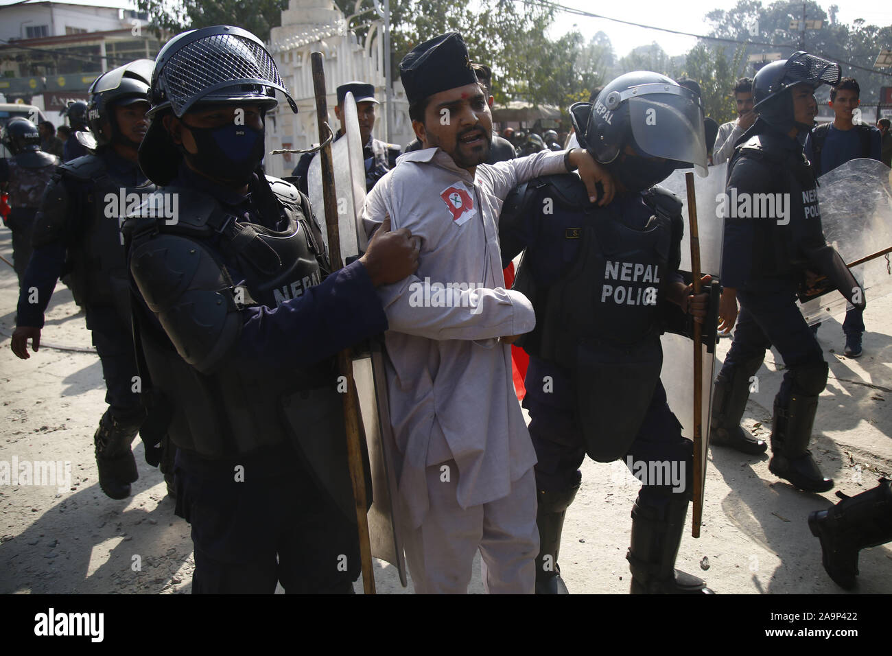 Kathmandu, Nepal. 17th Nov, 2019. Nepalese police personnel arrest ...