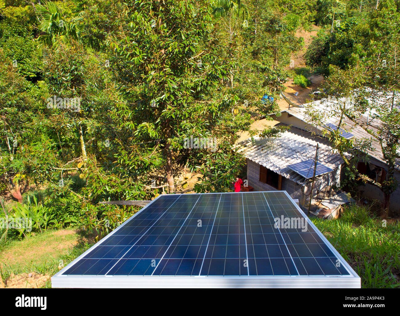 Small solar panel install on top of hill Stock Photo - Alamy