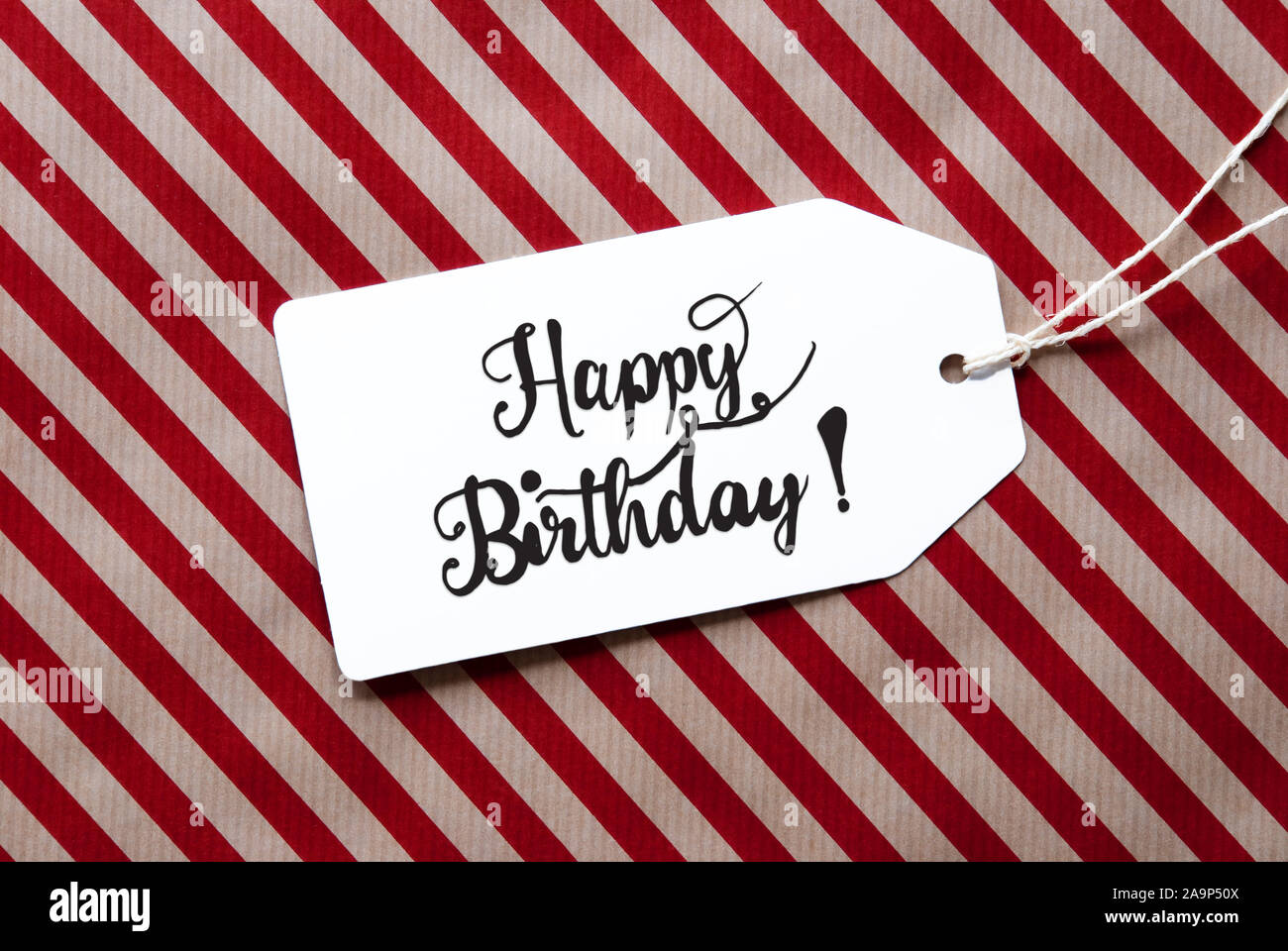 Red Wrapping Paper, Label With Happy Birthday Stock Photo - Alamy