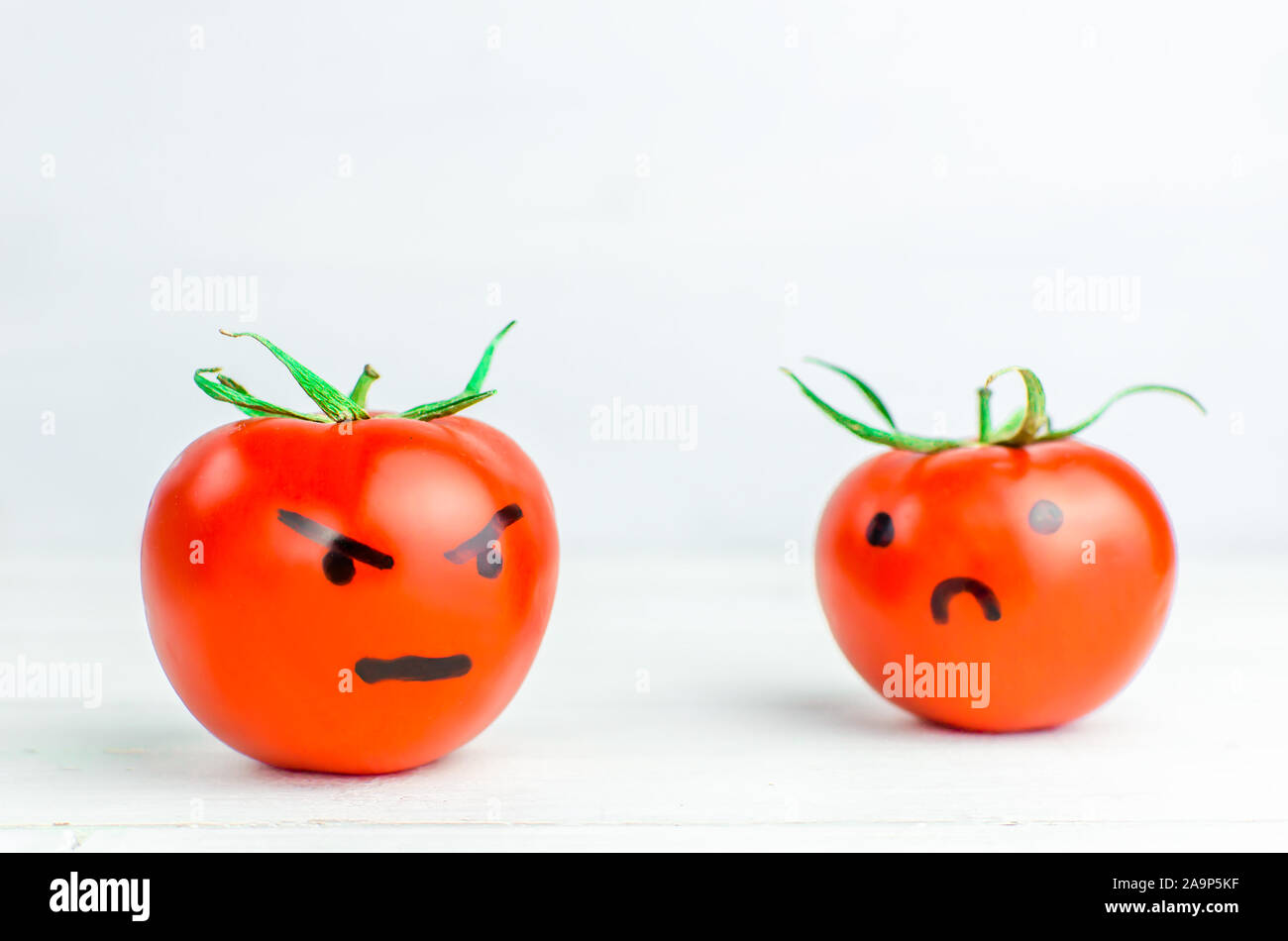 tomatoes with emotions. Relationship. angry and sad Stock Photo - Alamy