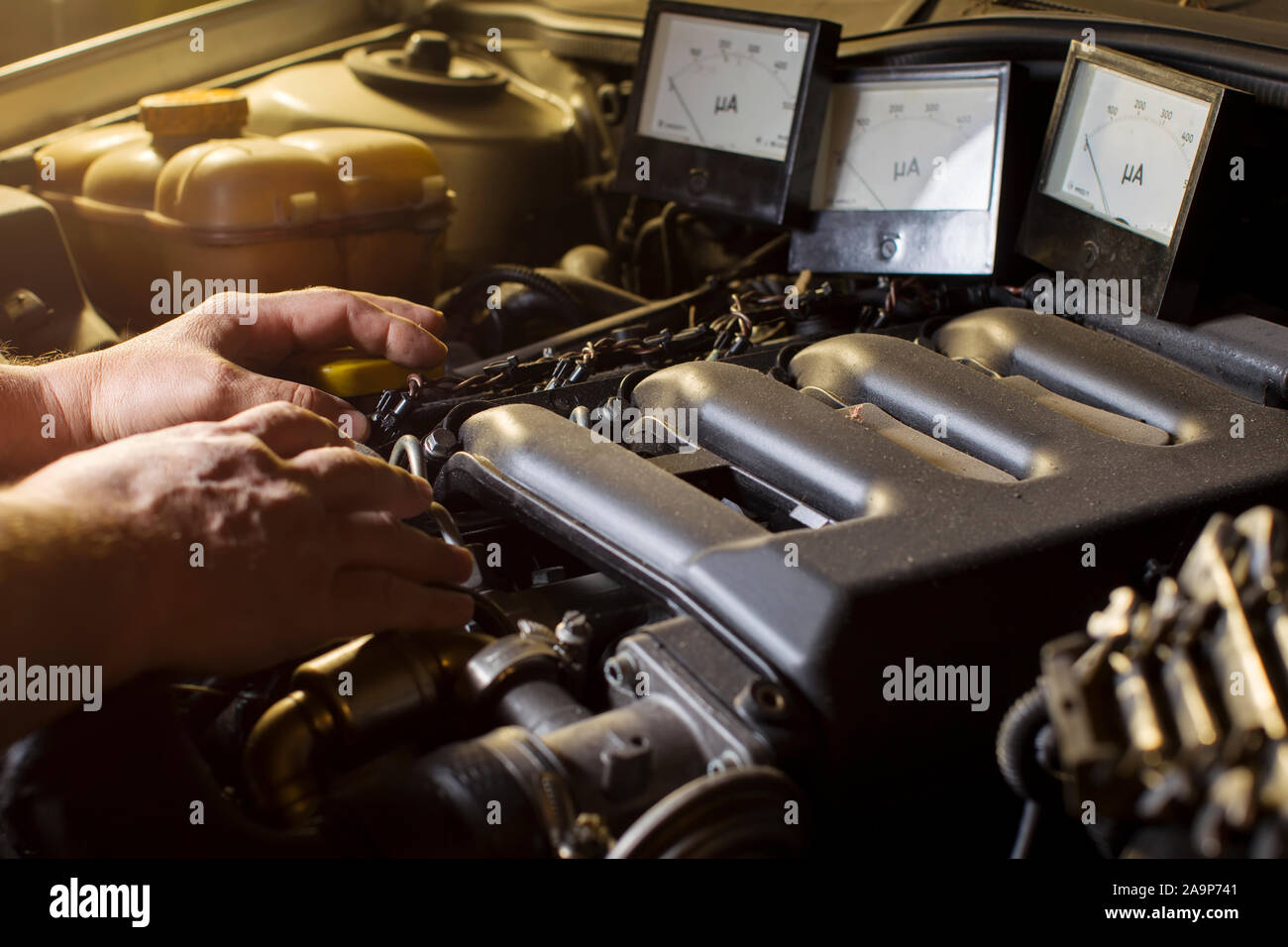 A finger indicates a faulty engine piston Stock Photo - Alamy