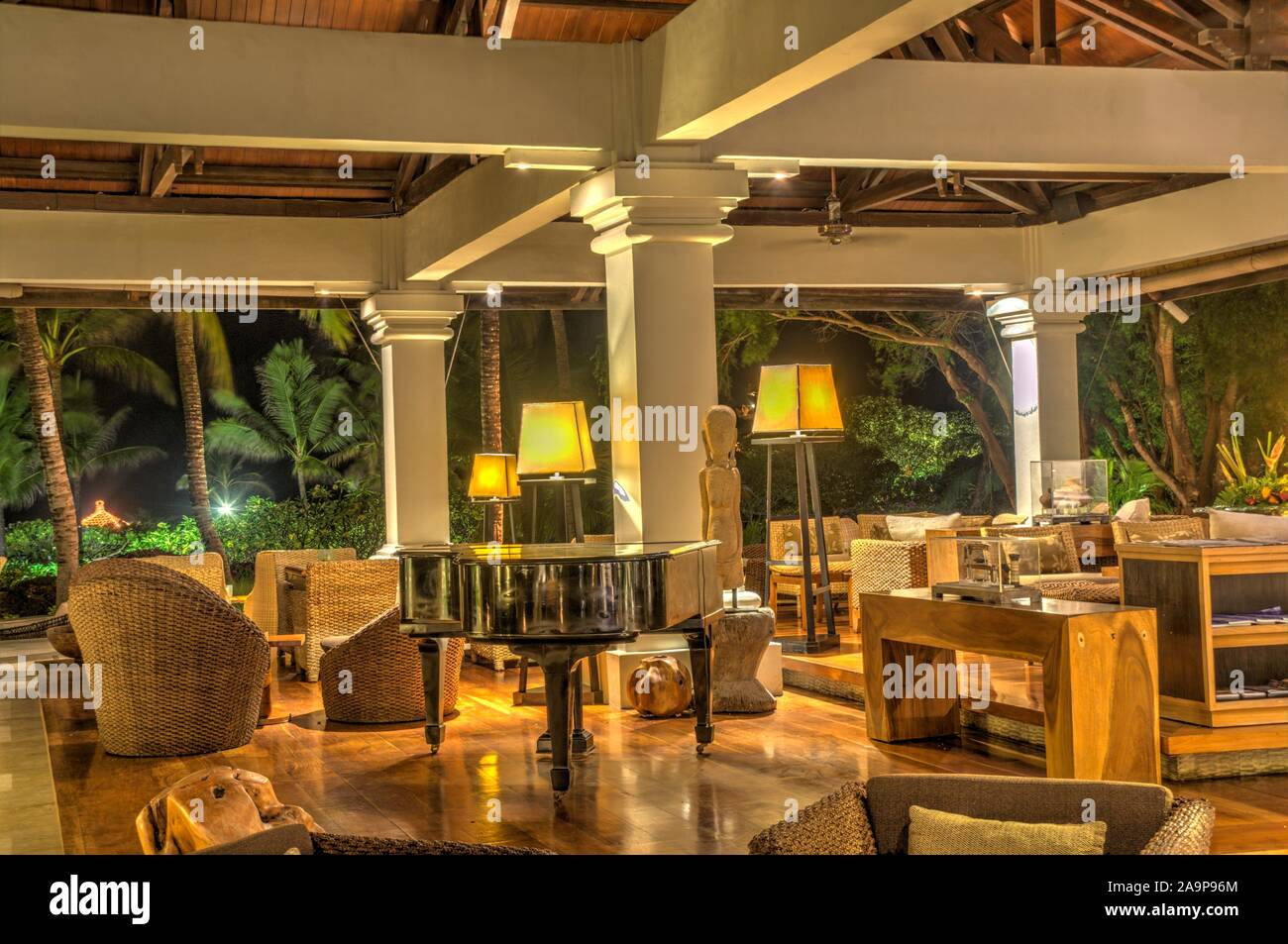lounge bar interior with tables and chairs and couches at night Stock ...