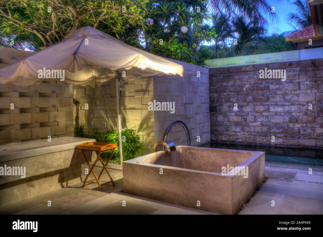 outdoor spa with umbrella and outdoor bath tub and outdoor wading pool ...