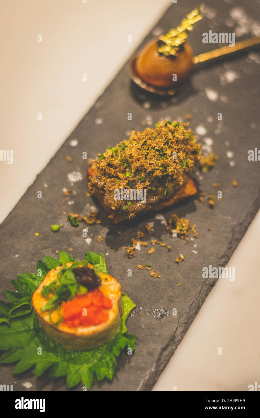 Trio Of Seasonal appetiser Smoked quail egg with Avruga caviar Mille ...