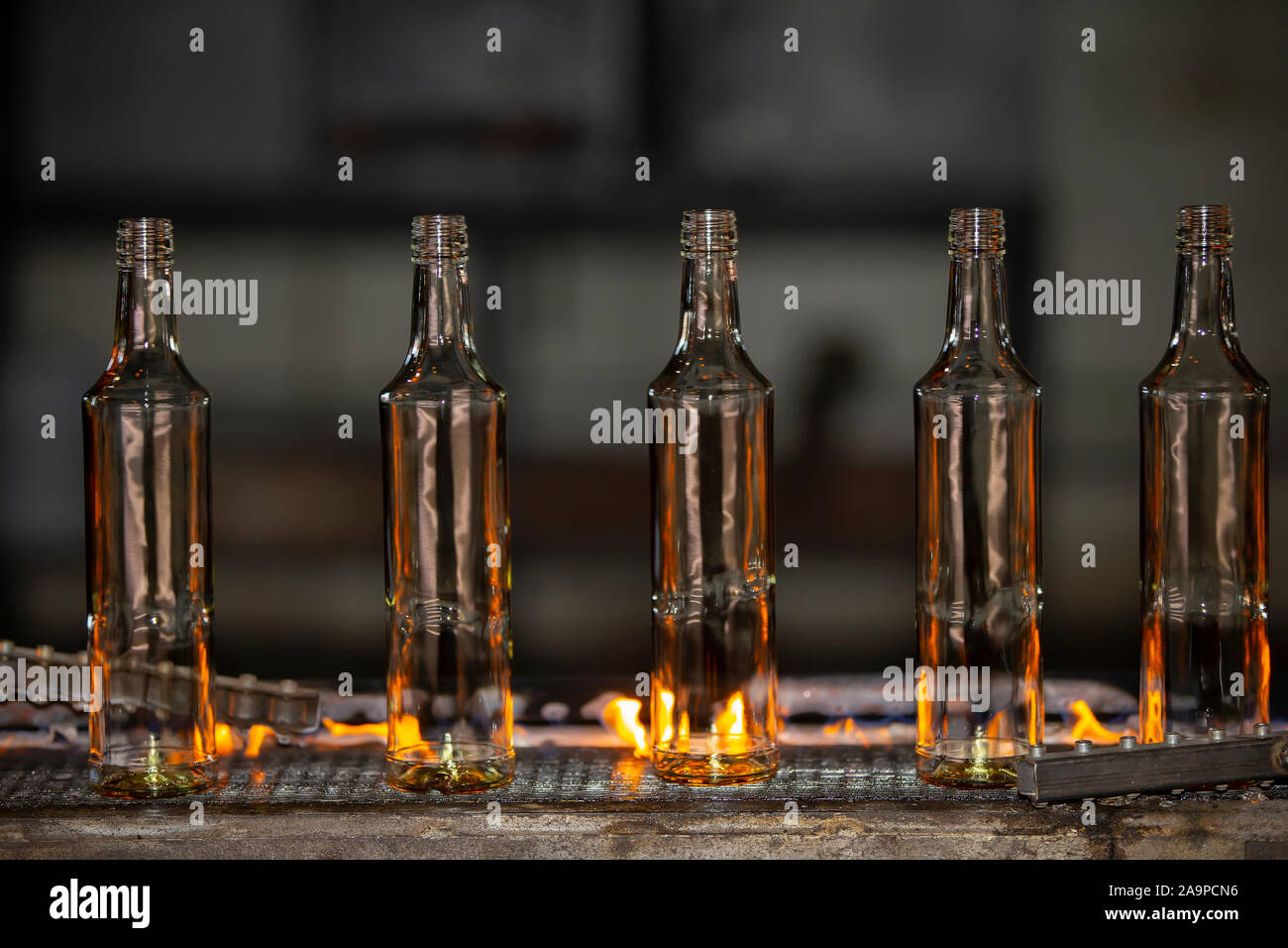 Molten glass bottles hi-res stock photography and images - Alamy
