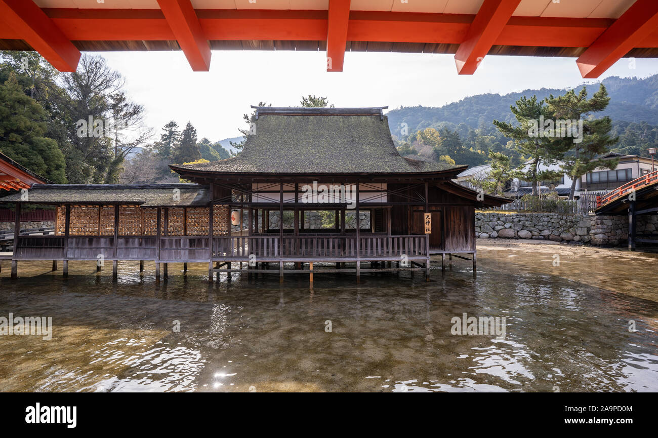 Itsukushima Shrine and its torii gate are unique for being built over ...