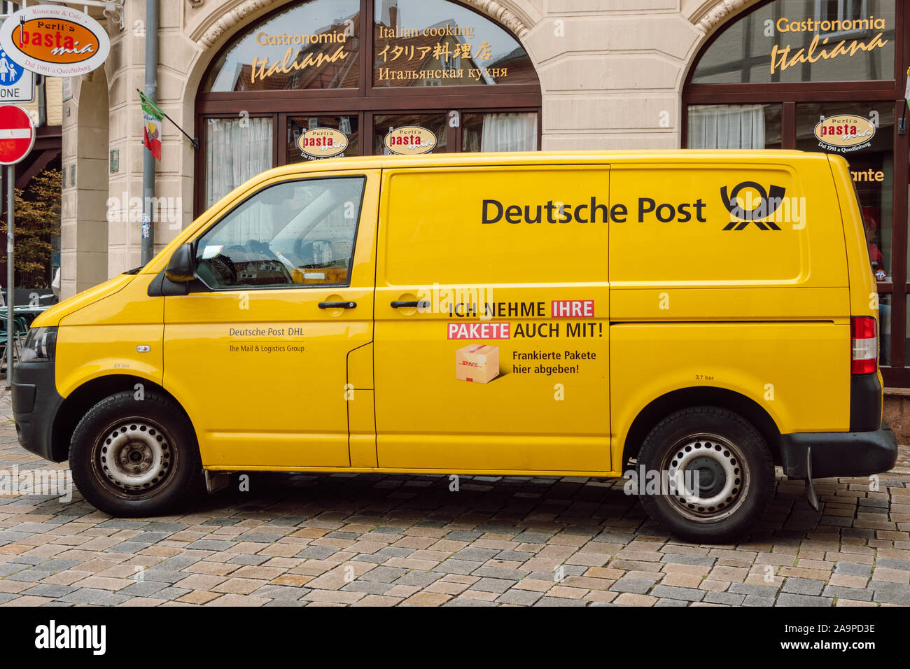 Deutsche Post Volkswagen van parked on the street. Nobody in the ...