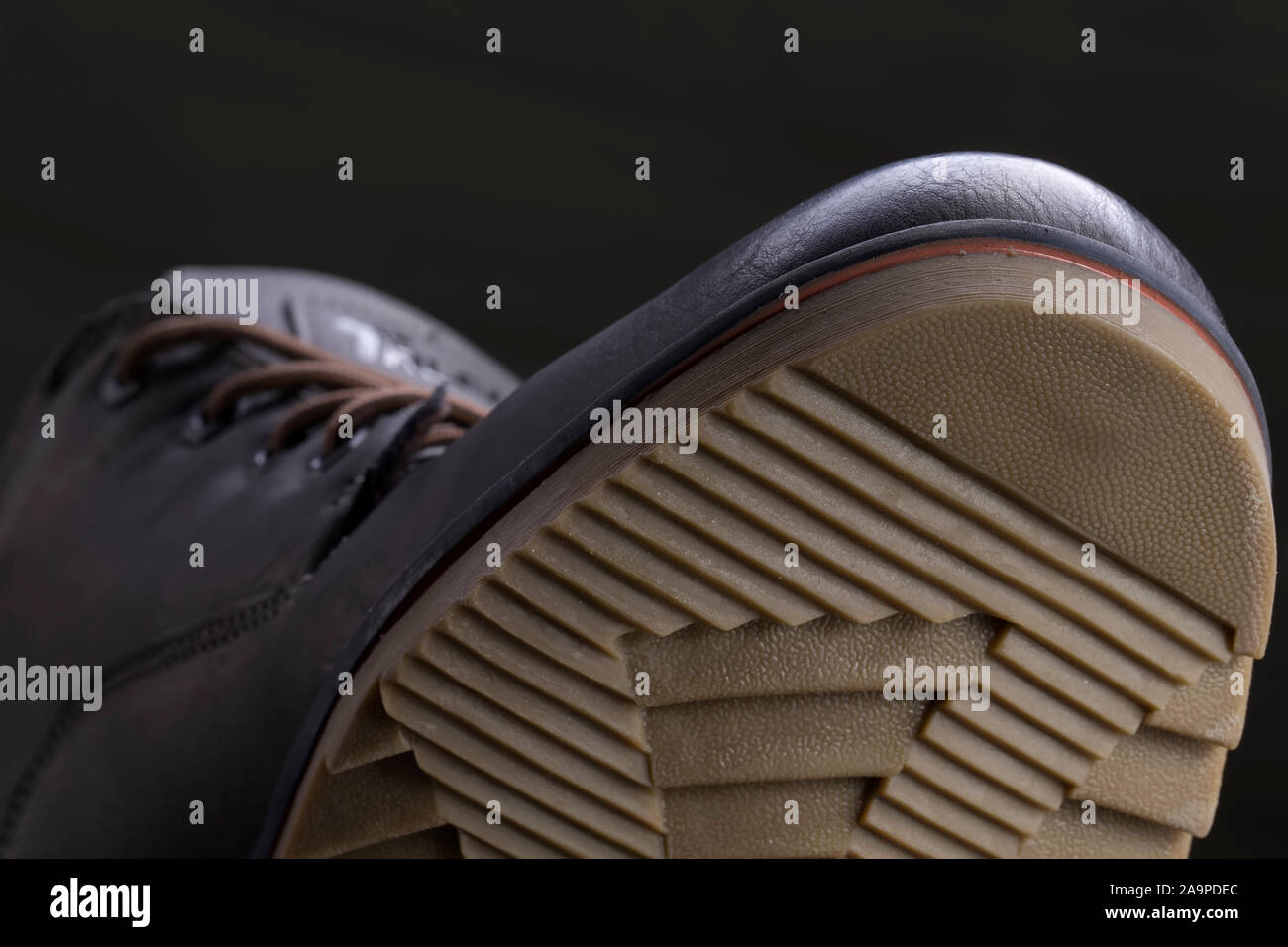 Part of a leather boot close-up. A fragment of the texture of a ...