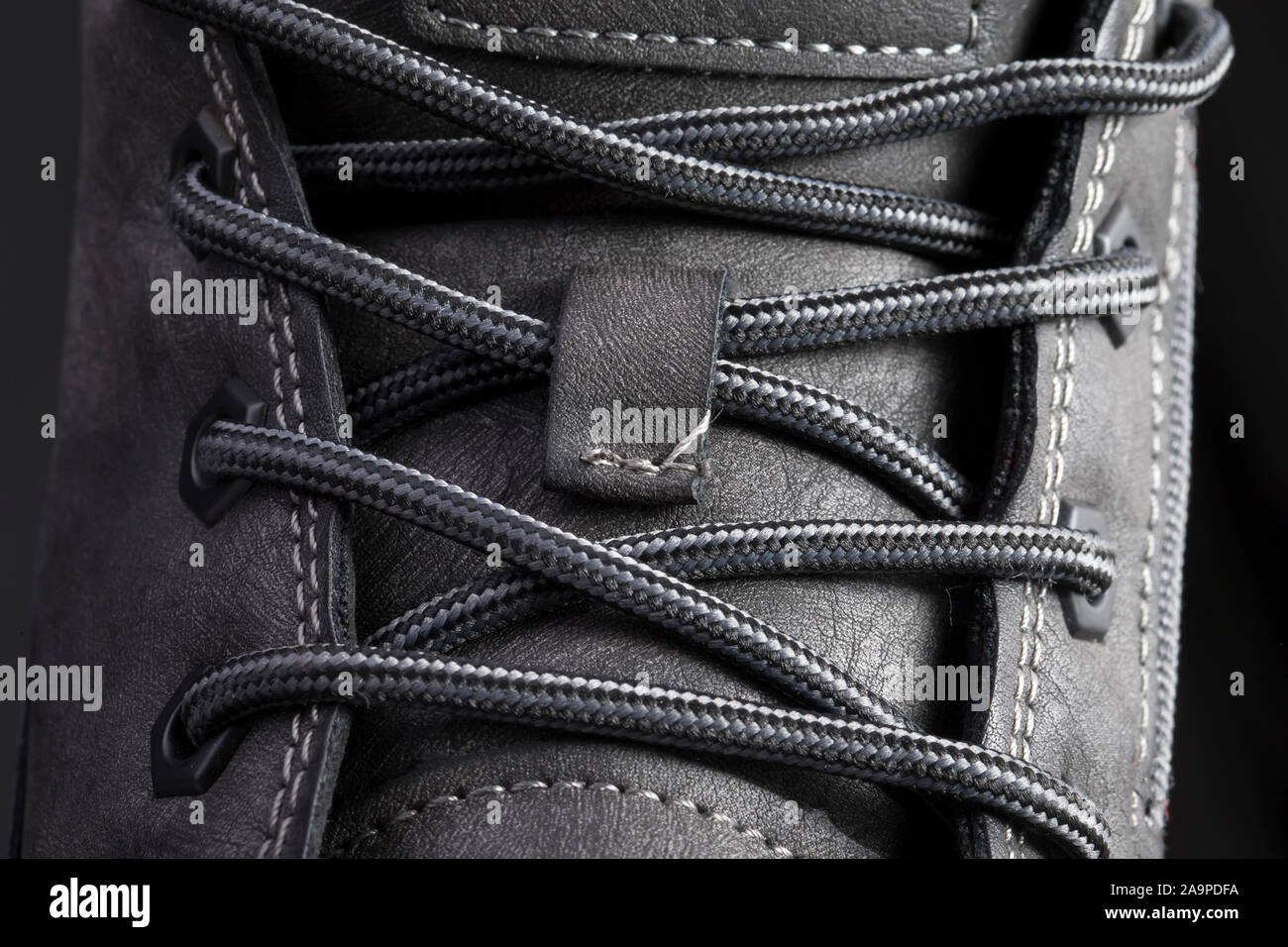 Part of a leather boot close-up. A fragment of the texture of leather ...