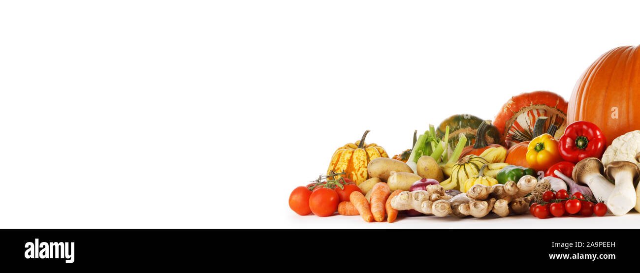 Harvest of many vegetables isolated on white background with copy space ...