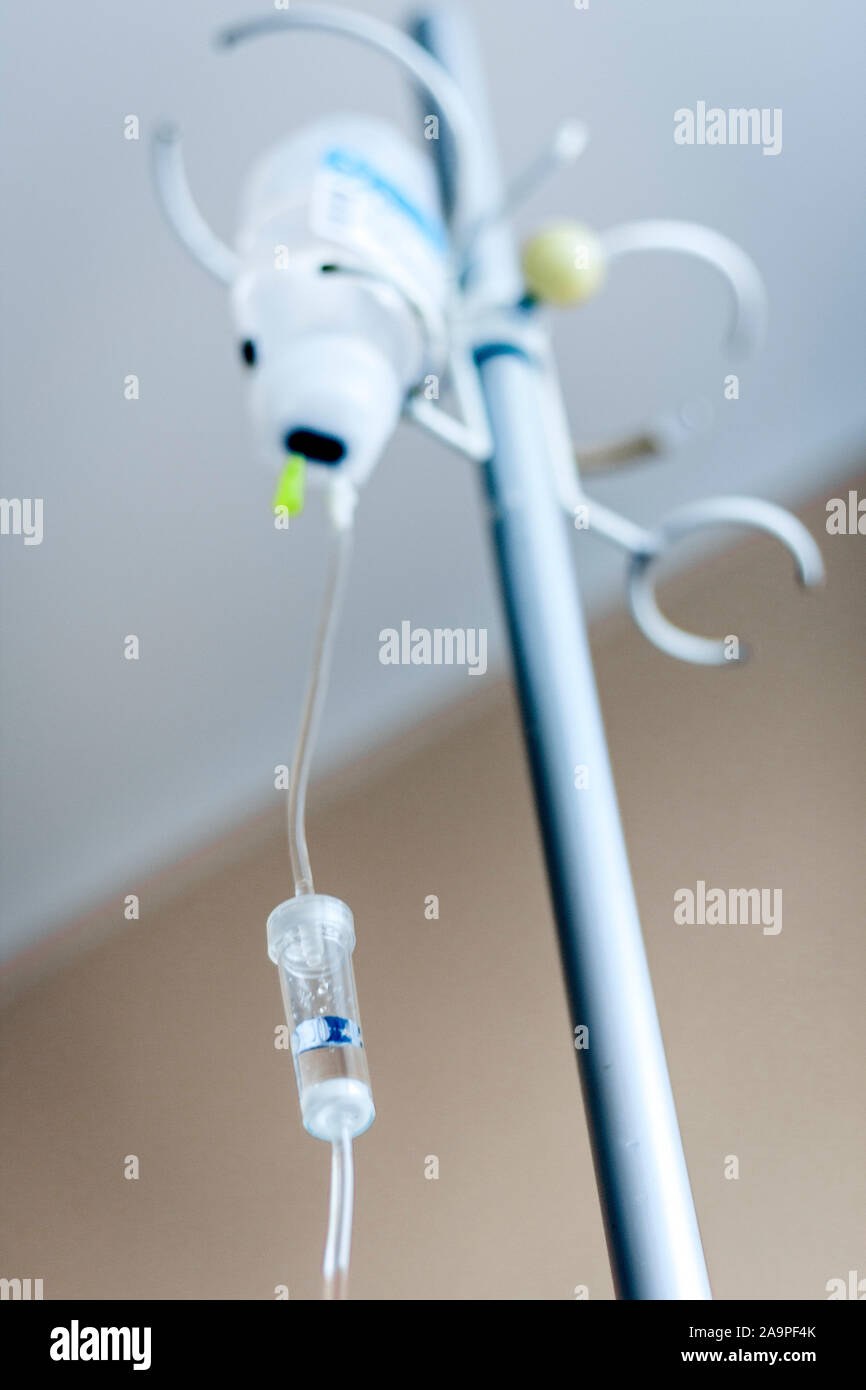 Close-up bottle of medicine on dropper system in the operating room ...
