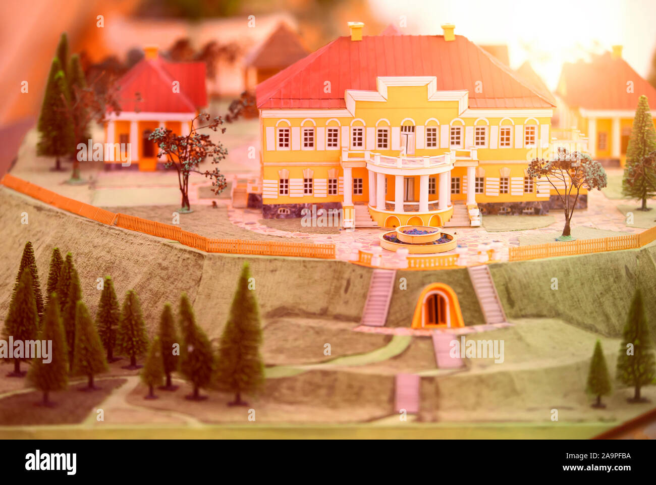 Miniature old house and trees. Layouts of buildings and infrastructure ...