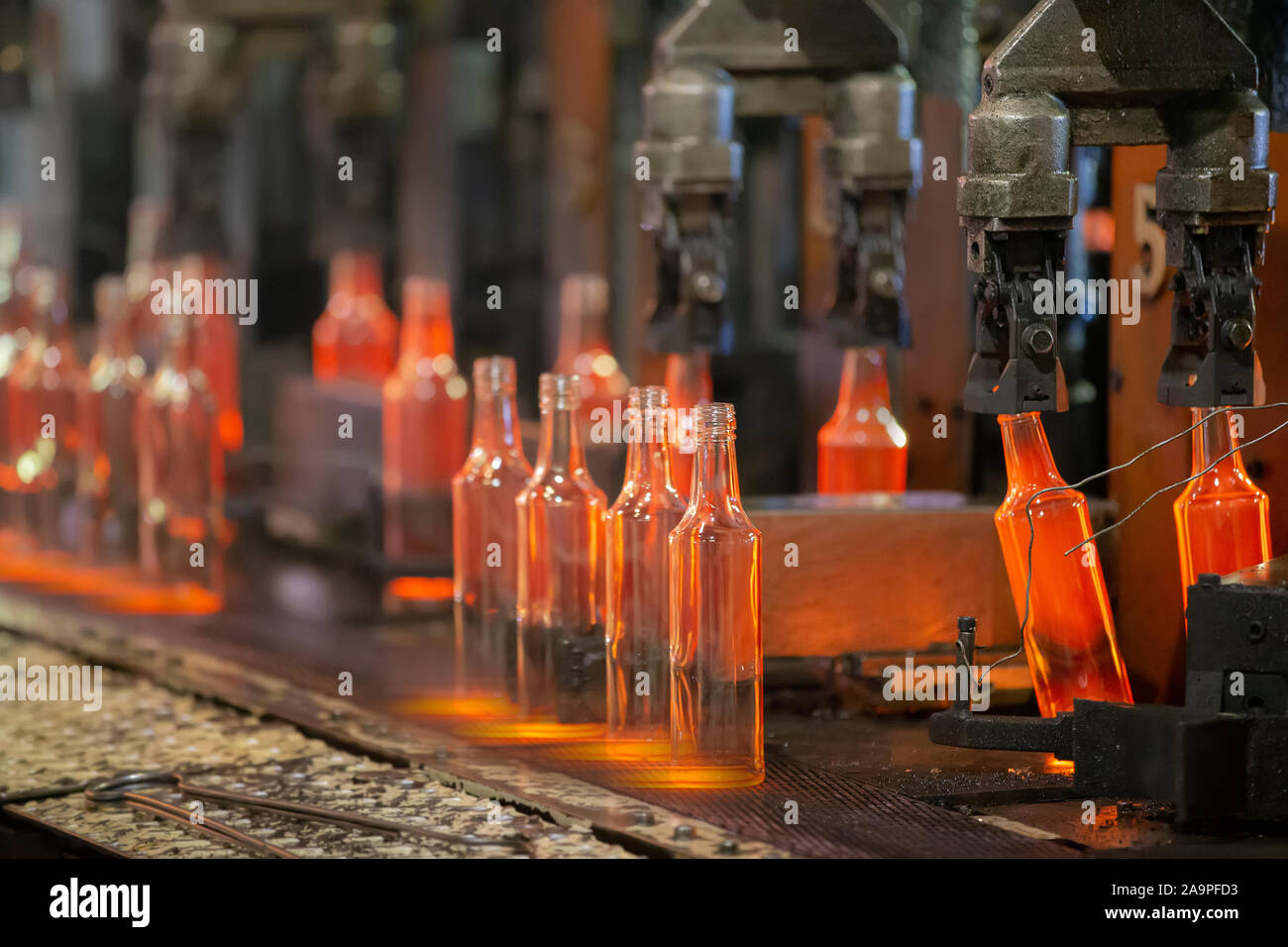 Molten glass bottles hi-res stock photography and images - Alamy