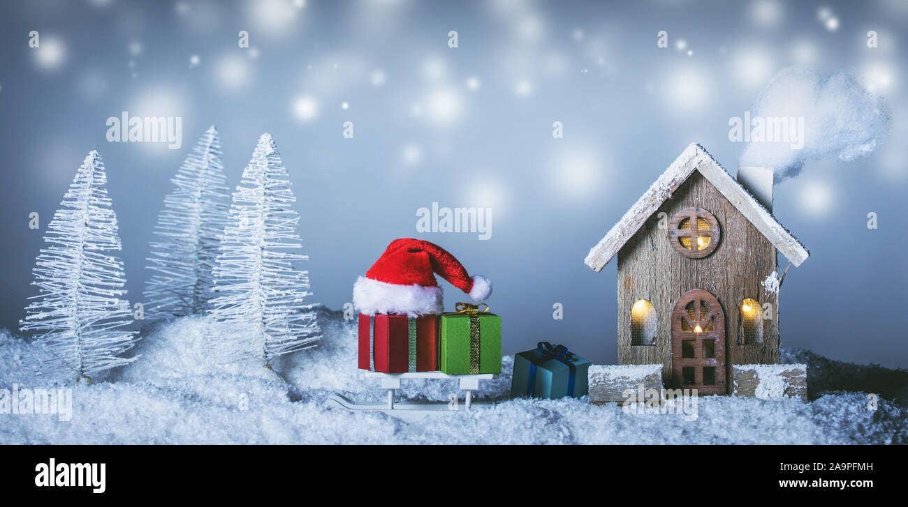 Small blue house santa claus hi-res stock photography and images - Alamy