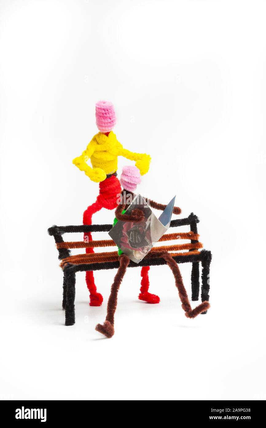 Pipe cleaner figures against a white background Stock Photo - Alamy