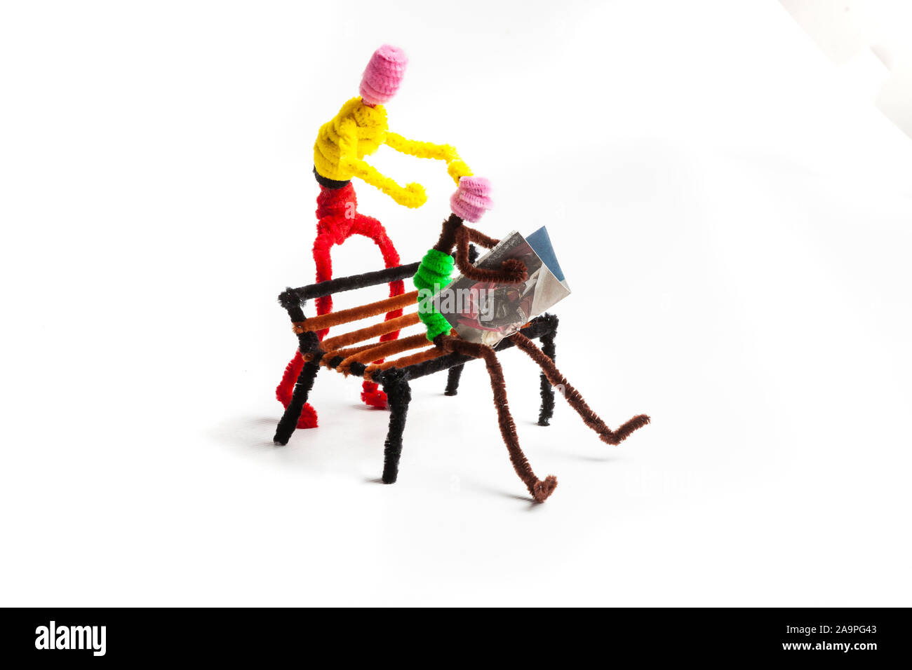 Pipe cleaner figures against a white background Stock Photo - Alamy