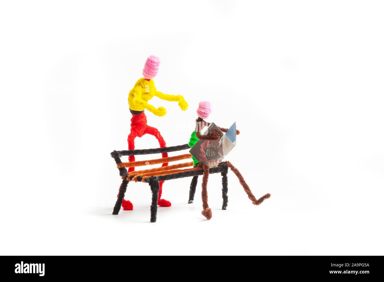 Pipe cleaner figures against a white background Stock Photo - Alamy