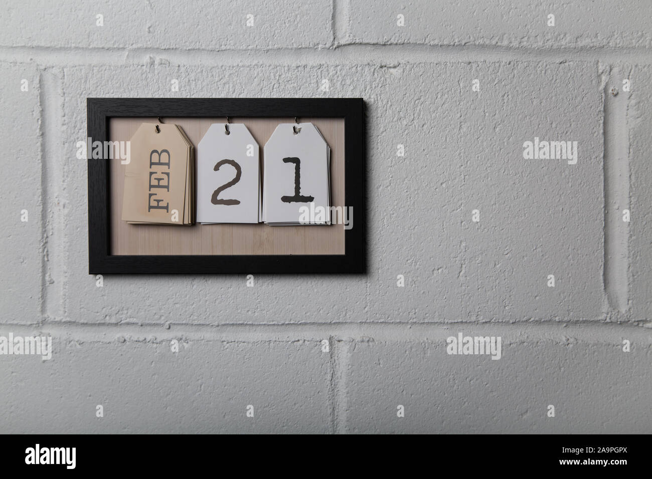 Wall Hanging Calendar in a Picture Frame Showing February 21 Stock ...