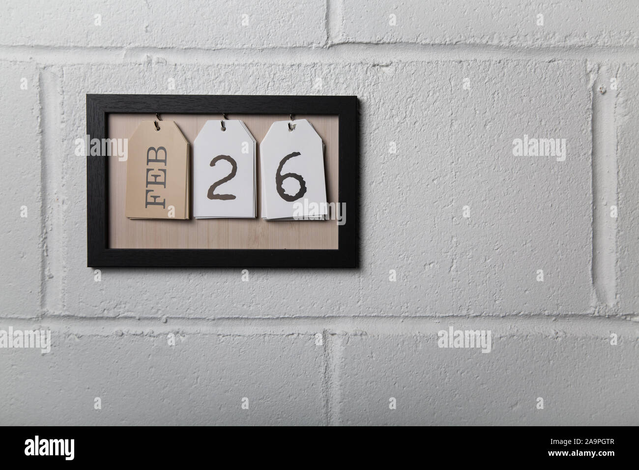 Wall Hanging Calendar in a Picture Frame Showing February 26 Stock ...