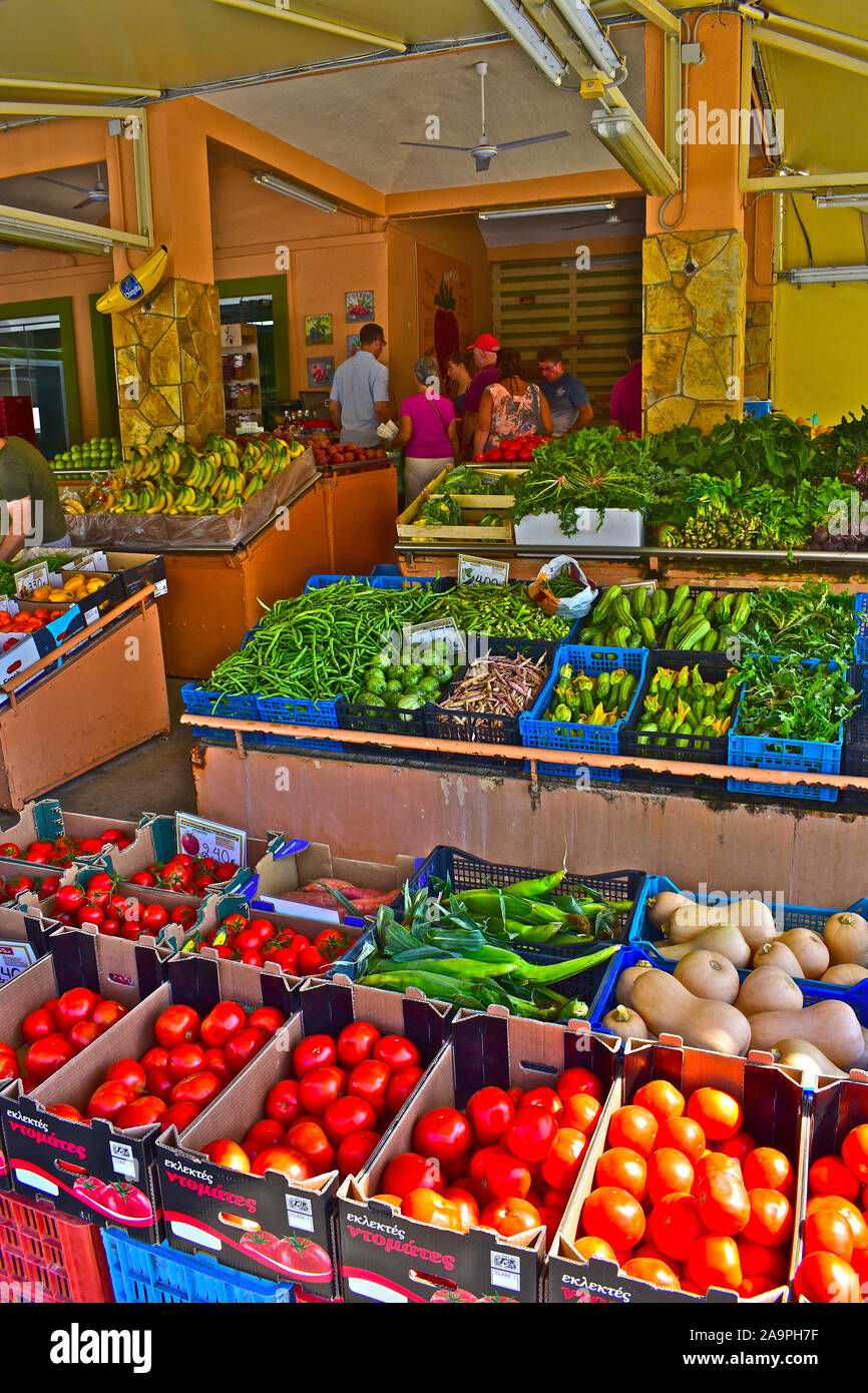 A colourful display of fresh fruit and vegetables in a market stall on ...