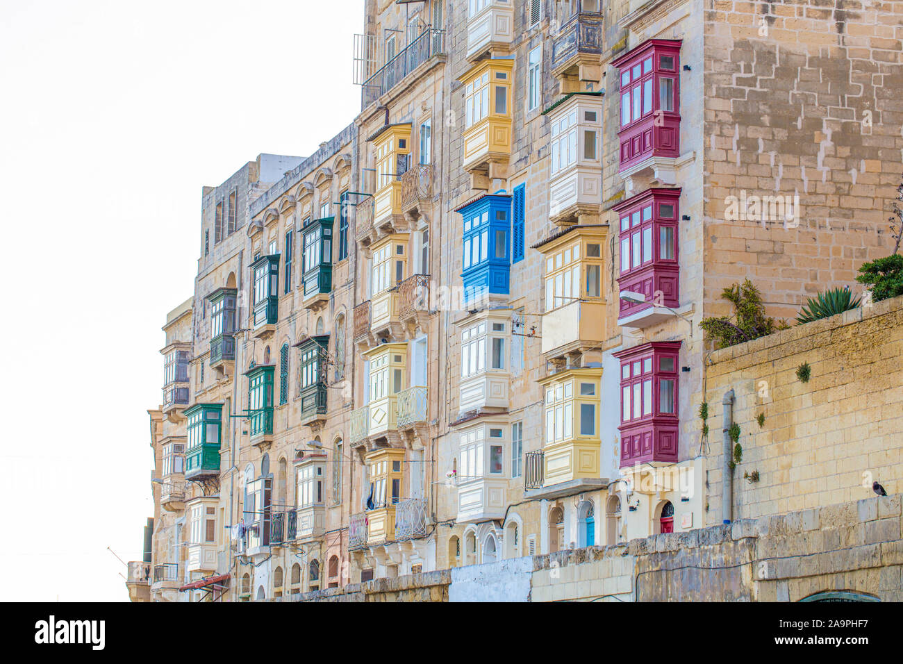 Colorful traditional maltese balconies facade, Valletta, Malta Stock ...
