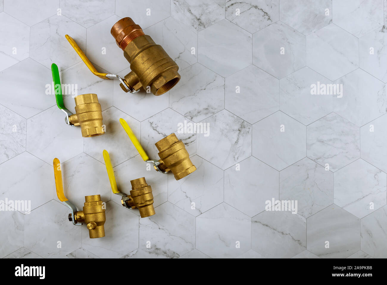 Connections of water pipes plumbing brass fitting on a water mixer tap ...