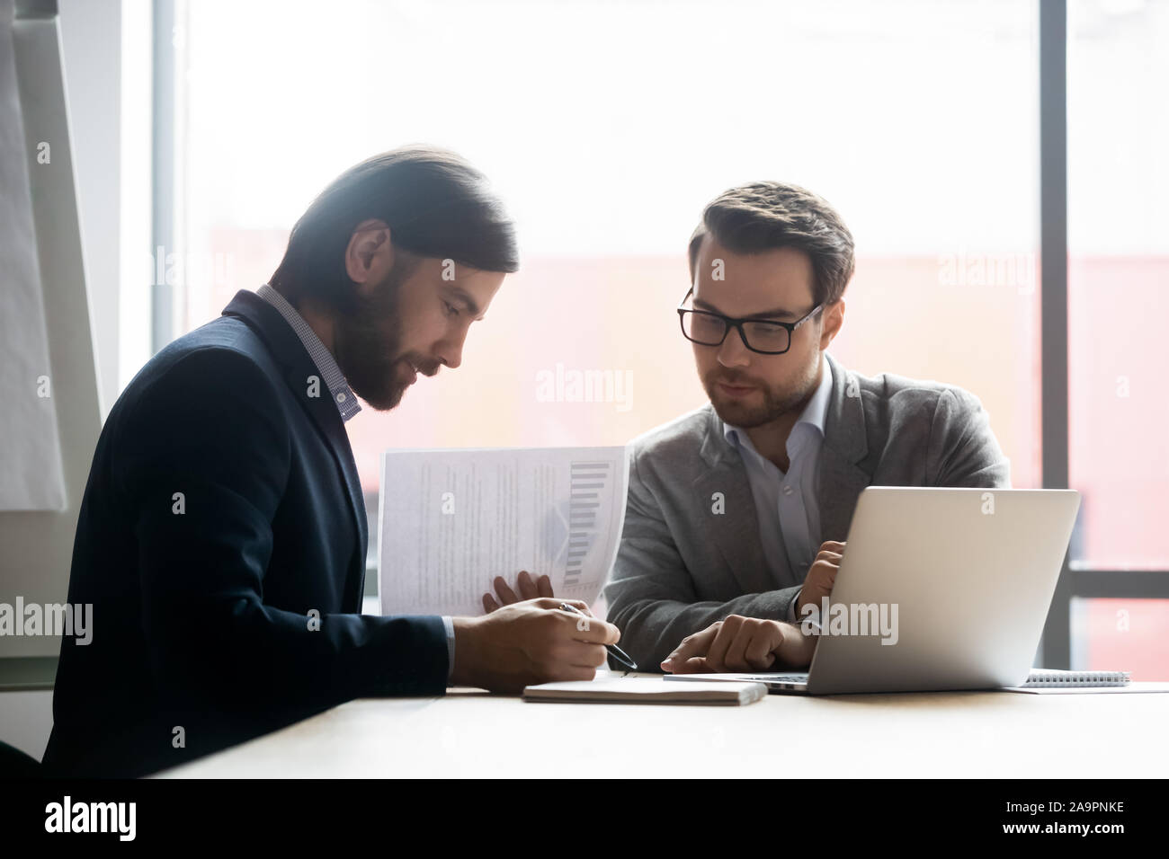 Young manager explaining marketing strategy ideas to colleague Stock ...