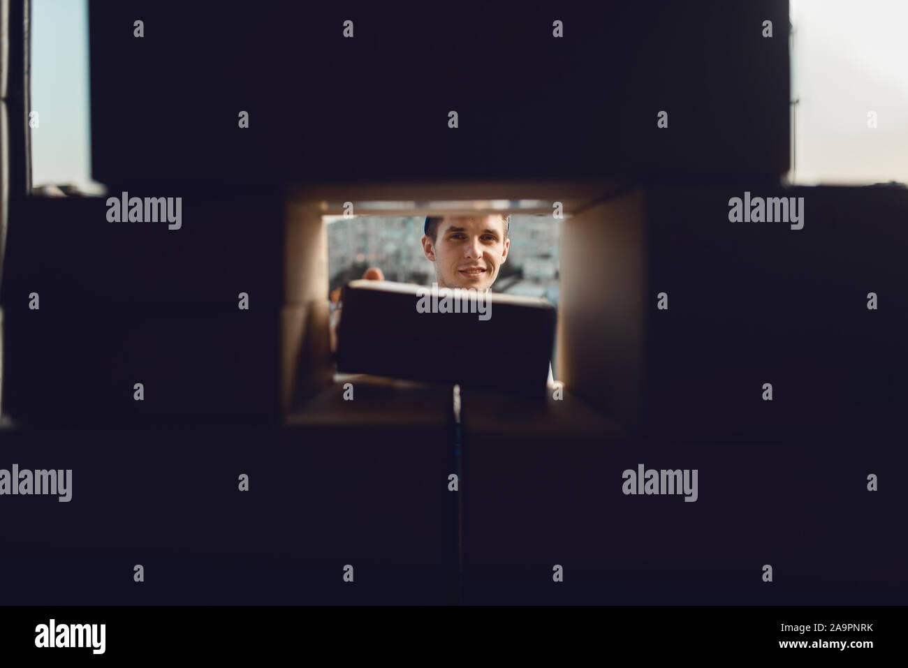 Looking at boxes hi-res stock photography and images - Alamy