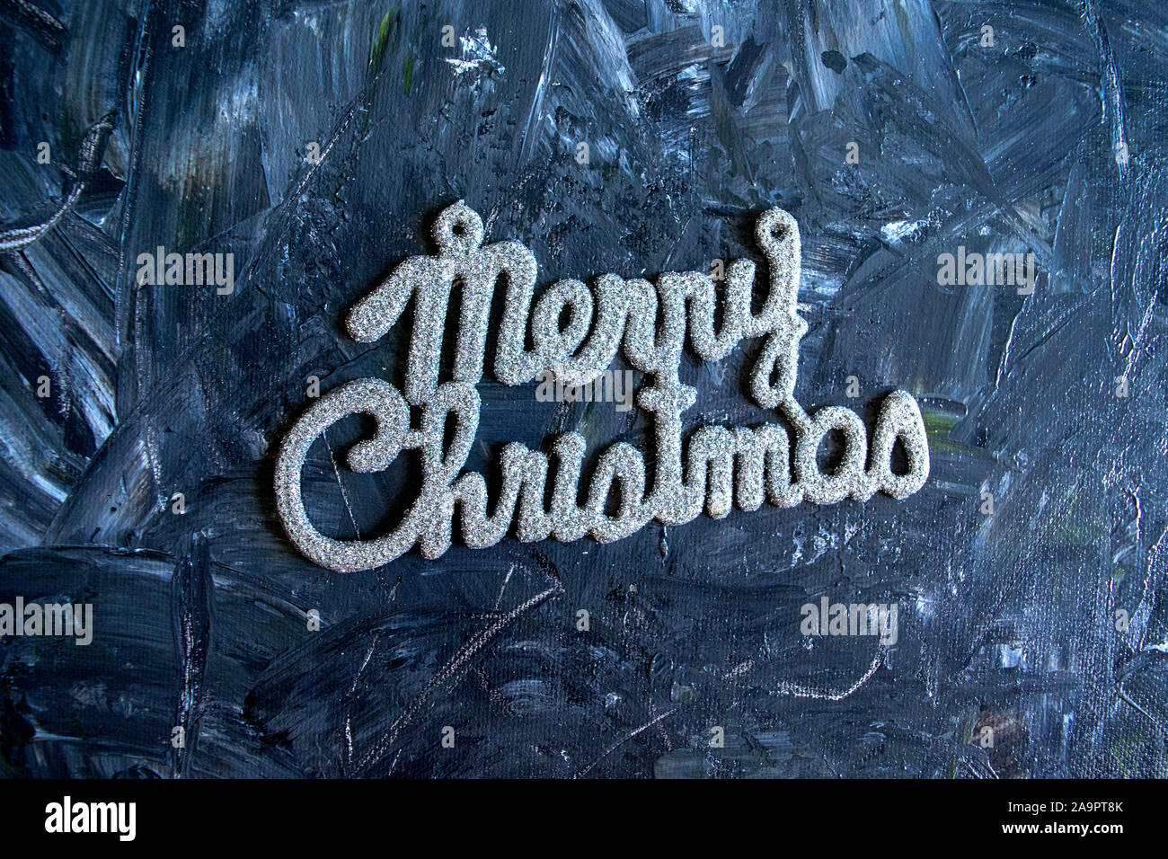 Merry Christmas caption on gray background. Silver shiny Merry ...
