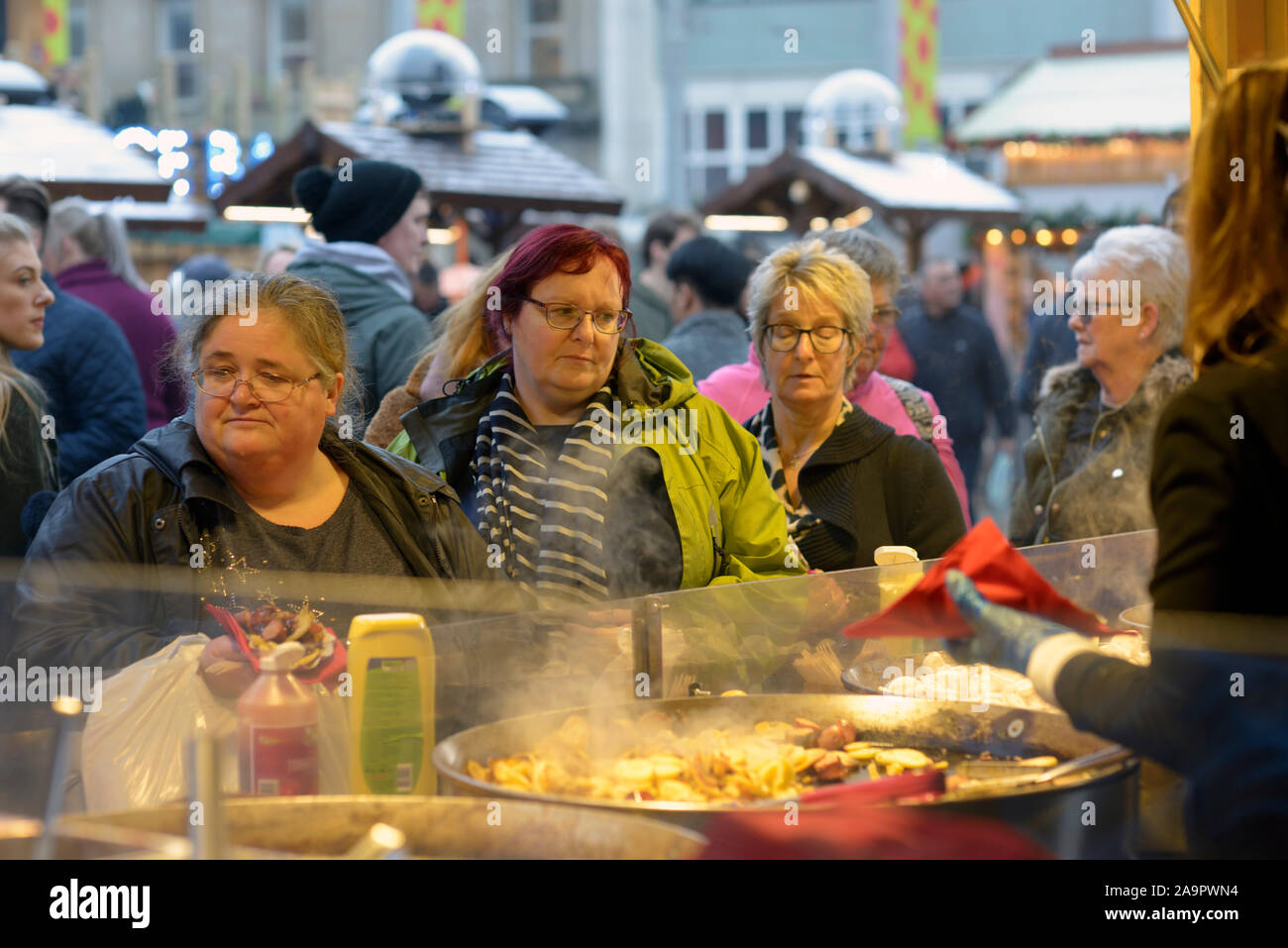Ladies waiting for food at stall, in Winter Wonderland, Nottingham ...