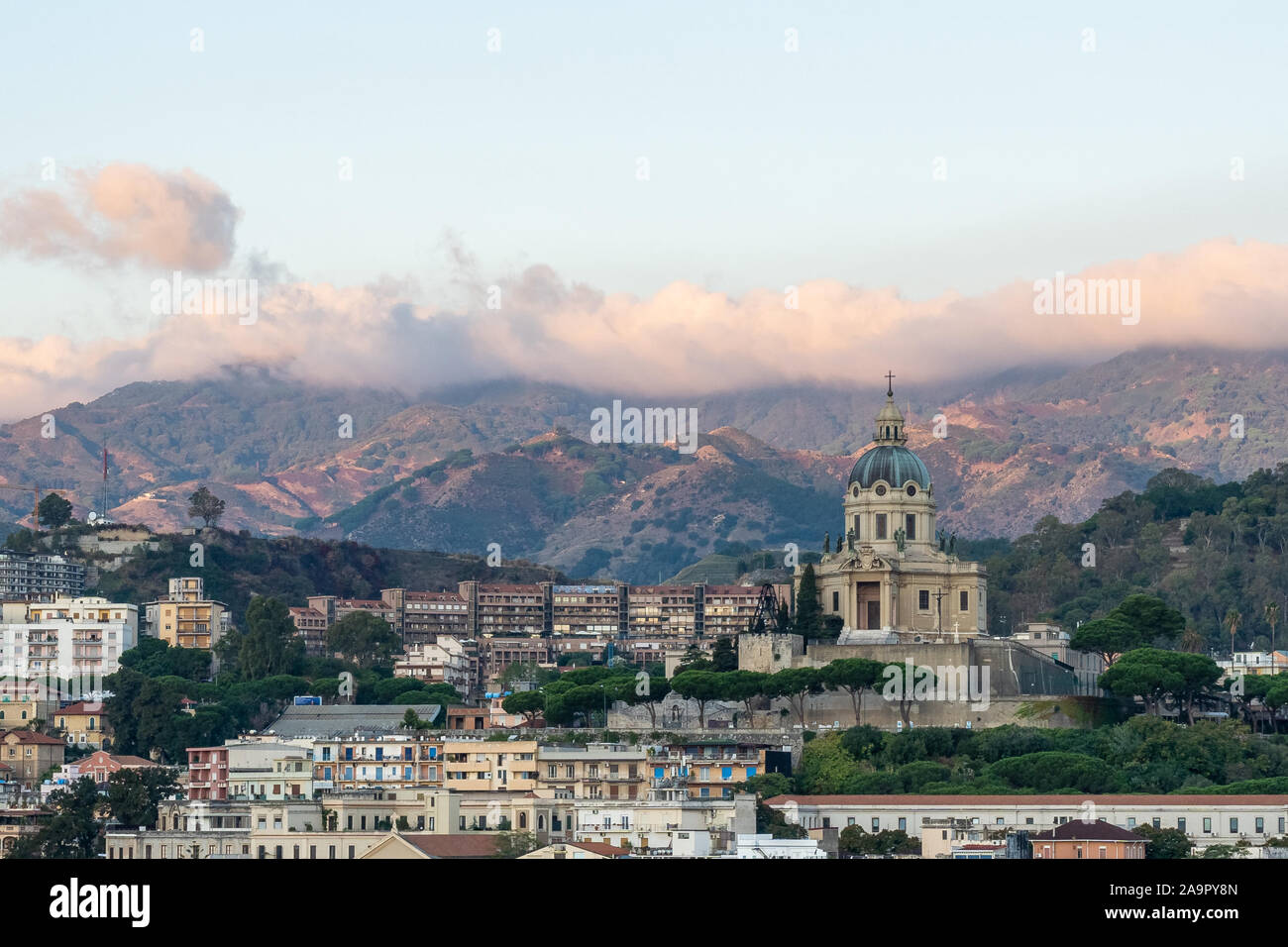 sunrise at messina harbor with view on church of christ, the city ...