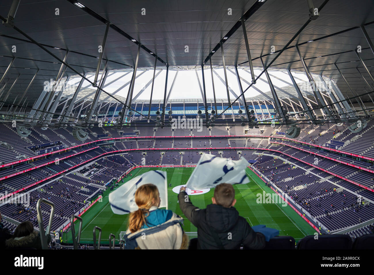 Tottenham hotspur stadium fans flags hi-res stock photography and ...
